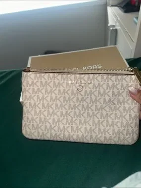 Michael Kors | Bags | Michael Kors Signature Mk Logo Wristlet In Beige ...